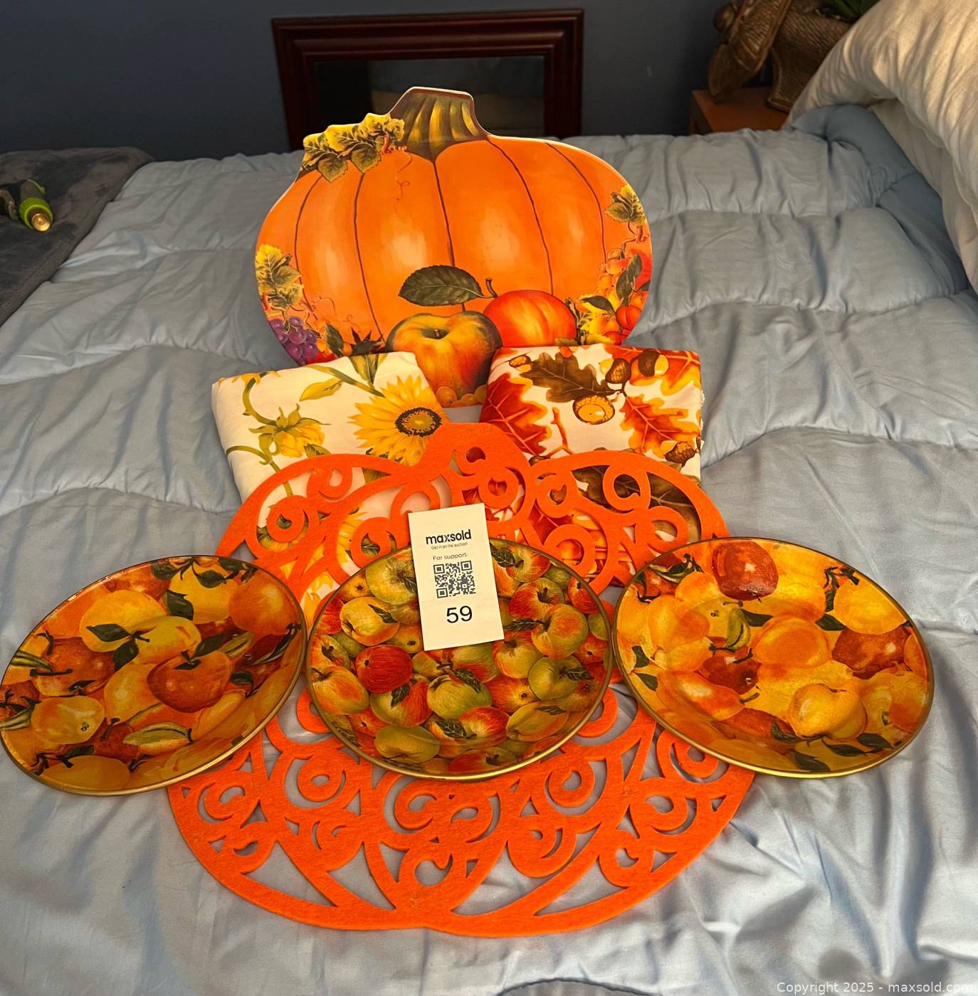 Fall-themed plates, pumpkin platter, linens | Maxsold