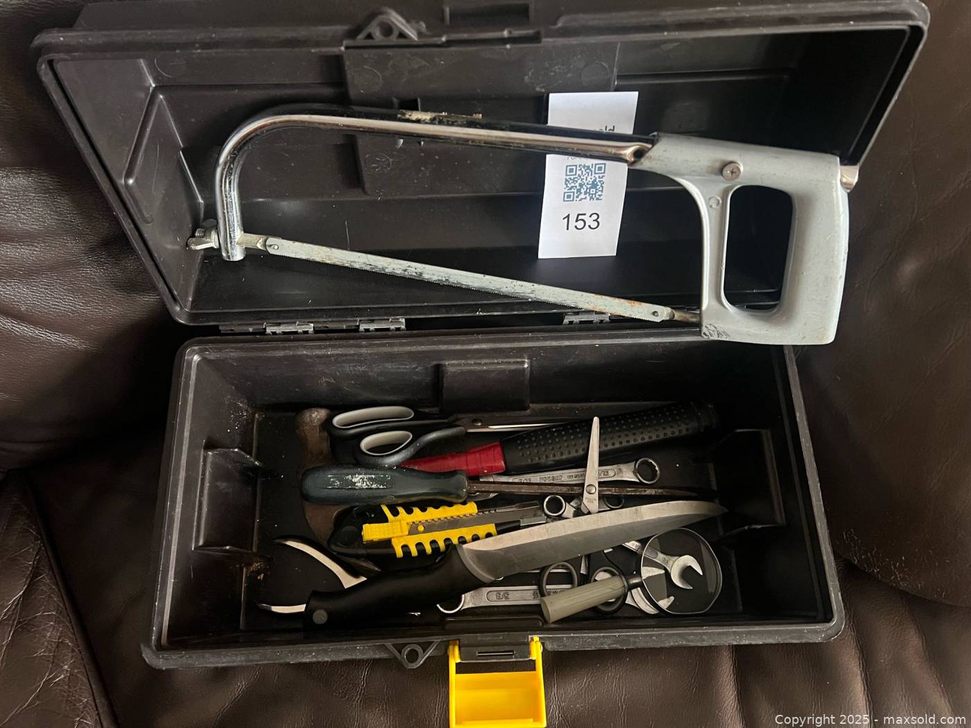Plastic toolbox with assorted hand tools | Maxsold