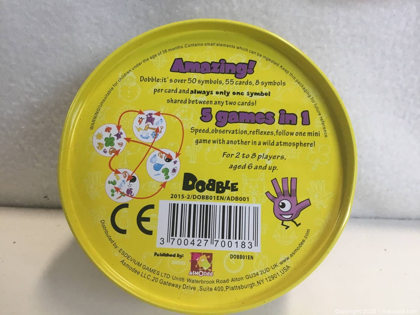 Dobble card game in tin | Maxsold