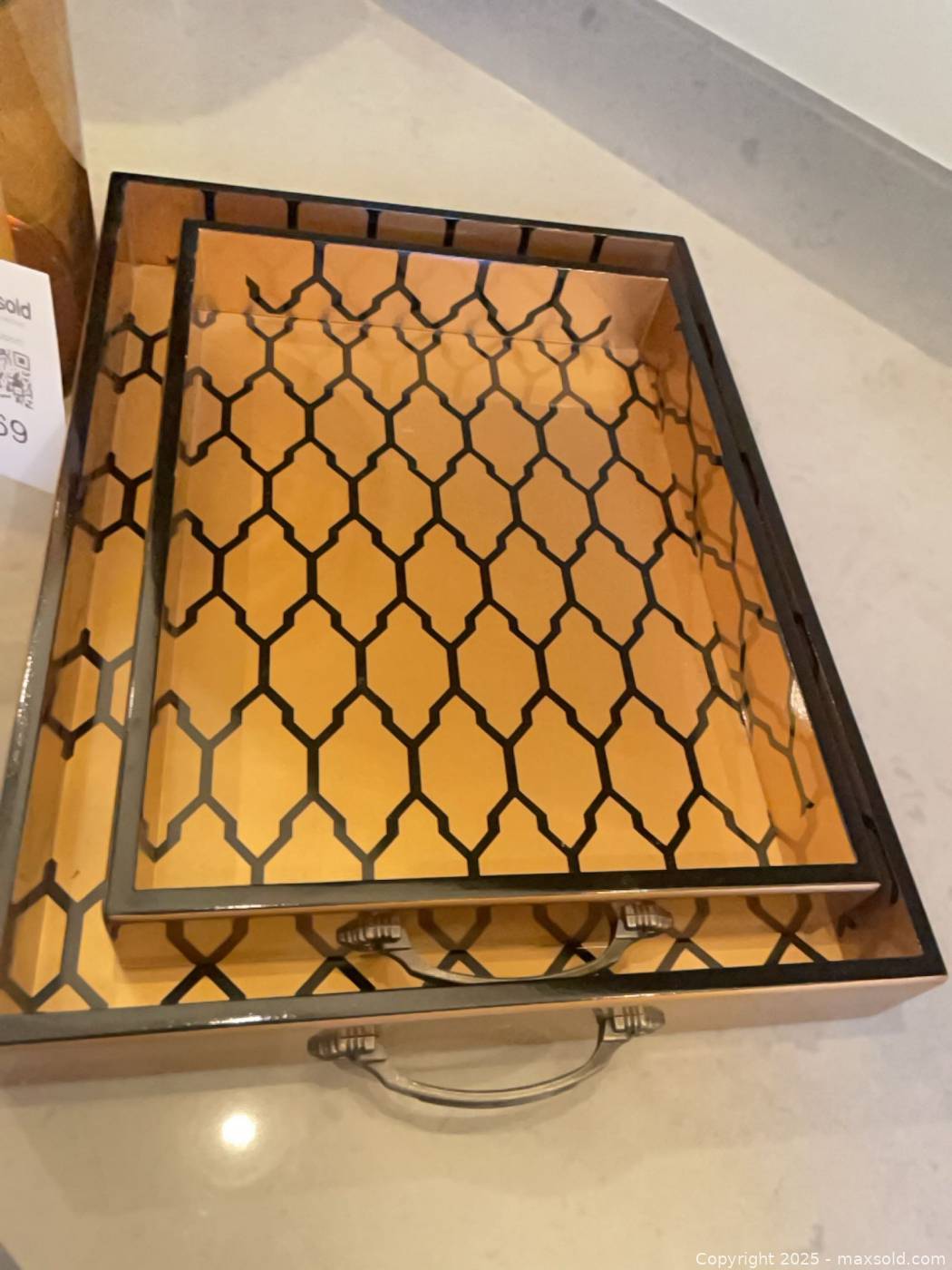 Amber glass RH hurricane, pillar candle, two gold lattice handled trays ...