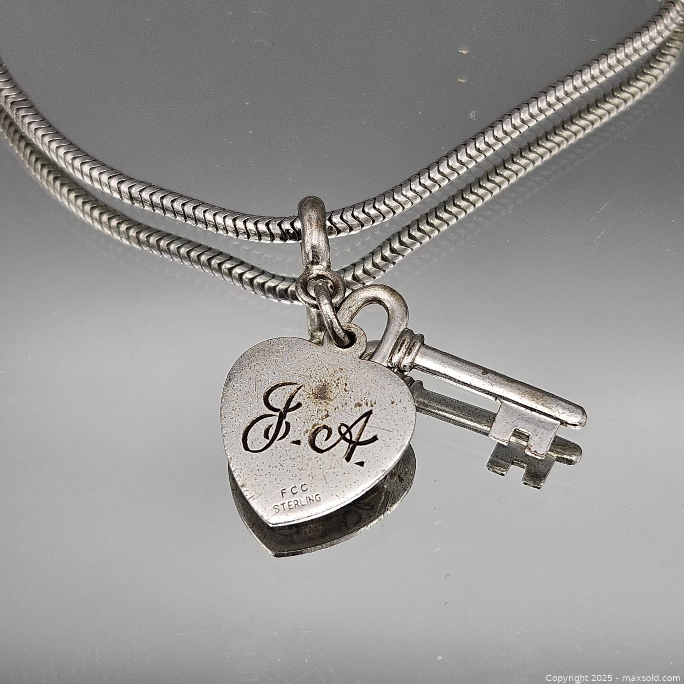 Silver-plated two-strand snake chain charm bracelet | Maxsold