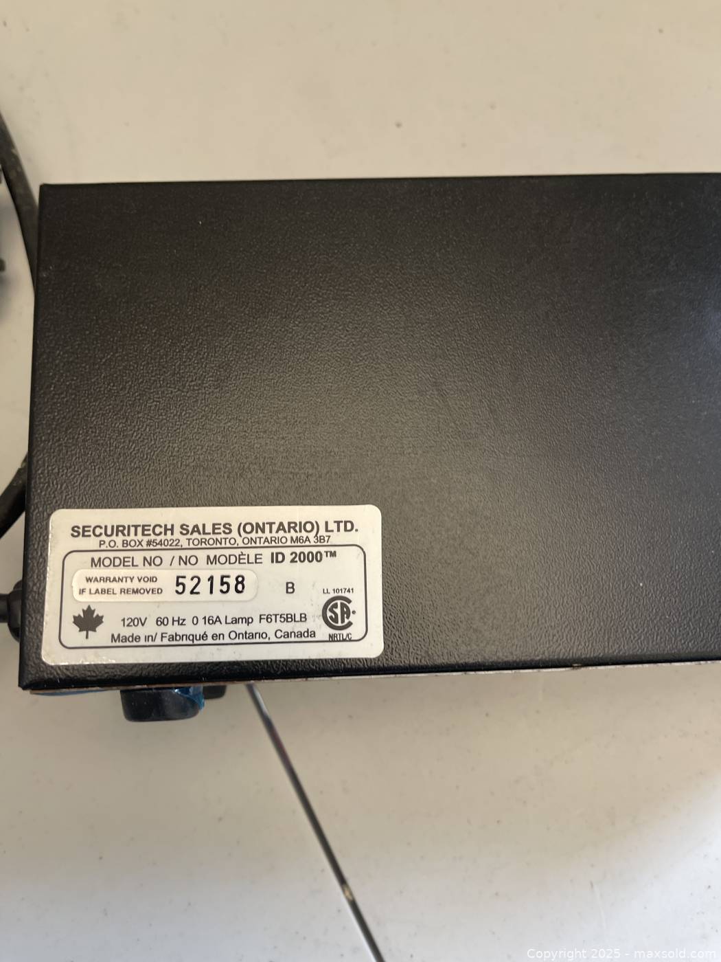 Securitech ID 2000 counterfeit detector | Maxsold