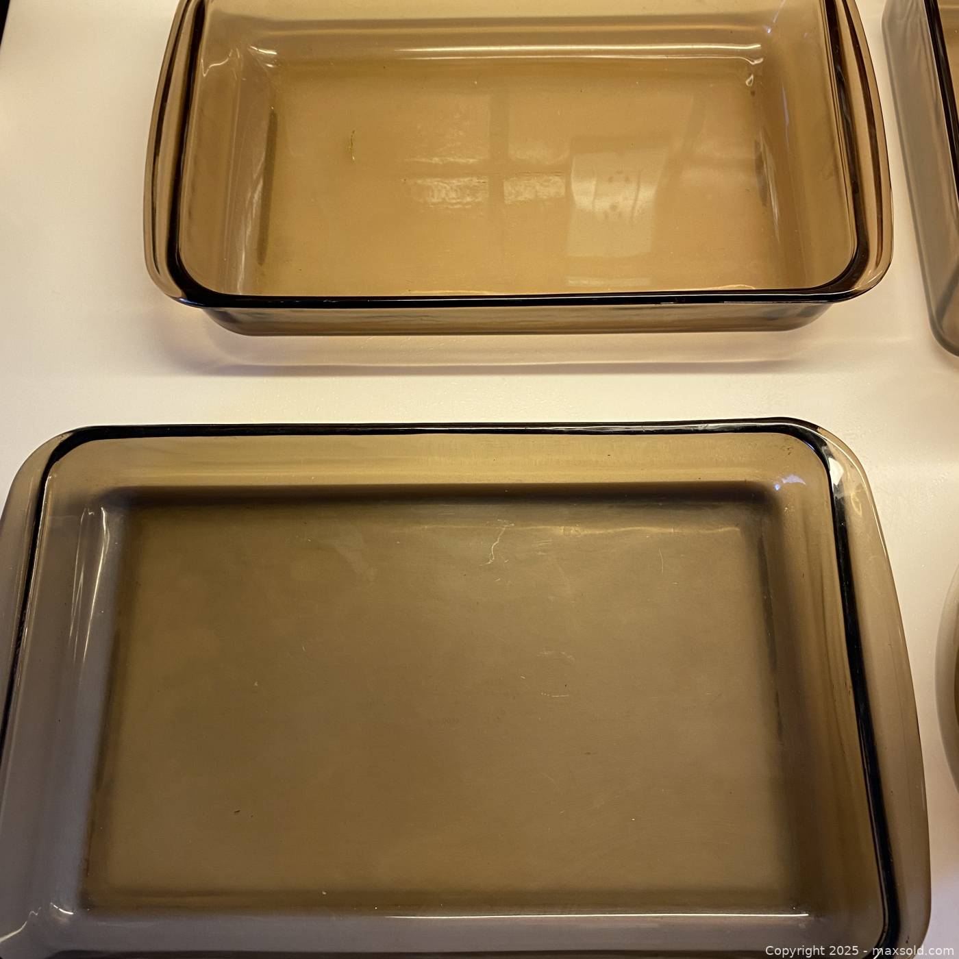 4 piece smoky brown Pyrex ovenware | Maxsold
