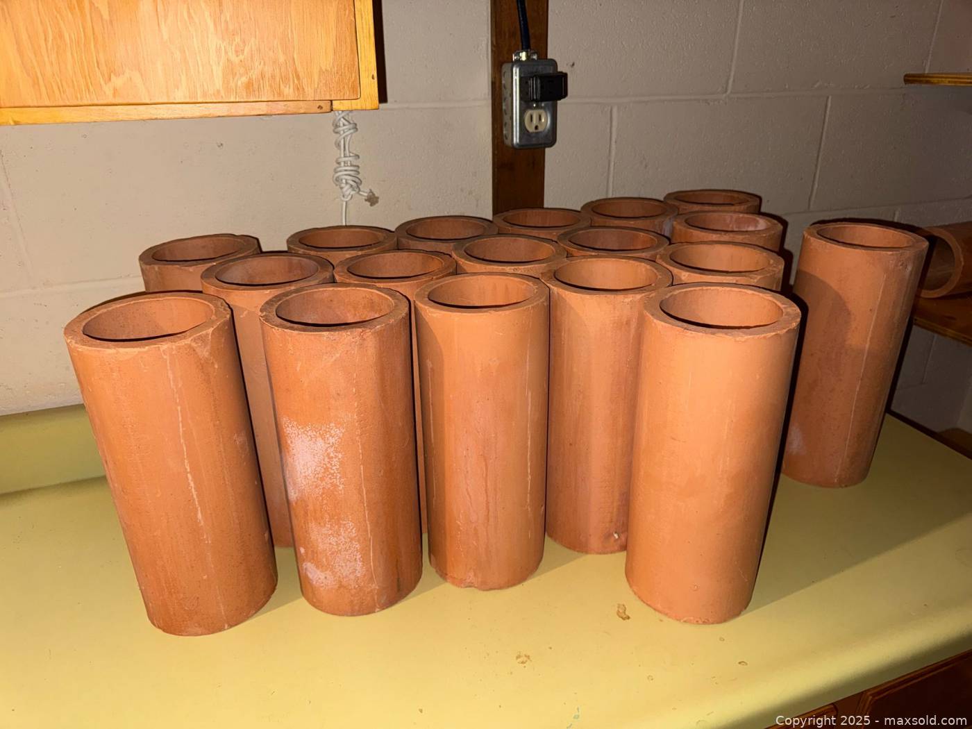 18 terracotta clay cylindrical tubes | Maxsold