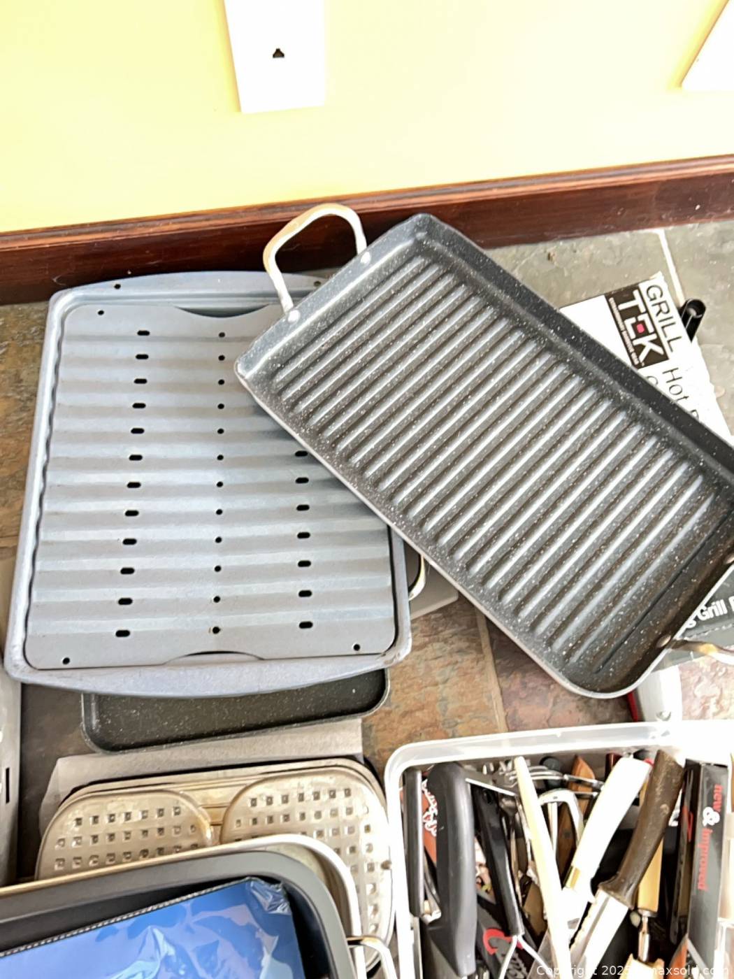 Baking pans, grill roller, utensils lot | Maxsold