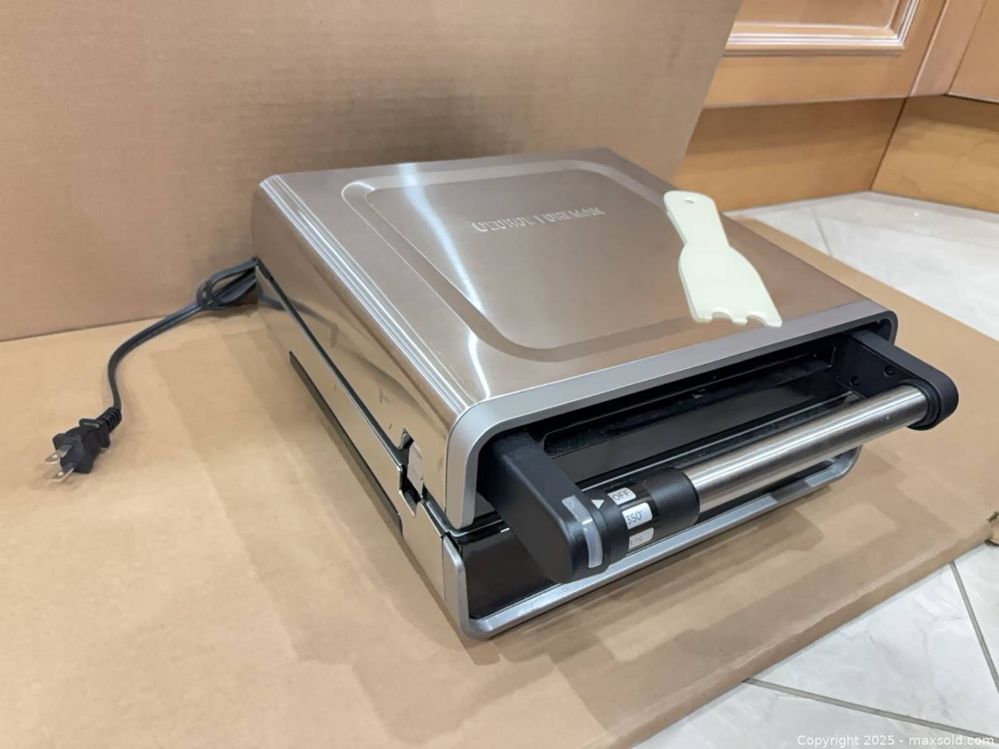 George Foreman brushed stainless steel toaster oven | Maxsold