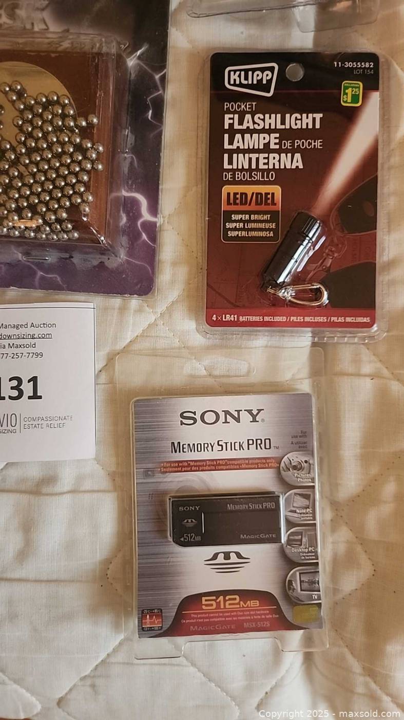 Monster THX Cable, 7-LED Headlamp, Pocket Flashlight, Sony 512 MB ...