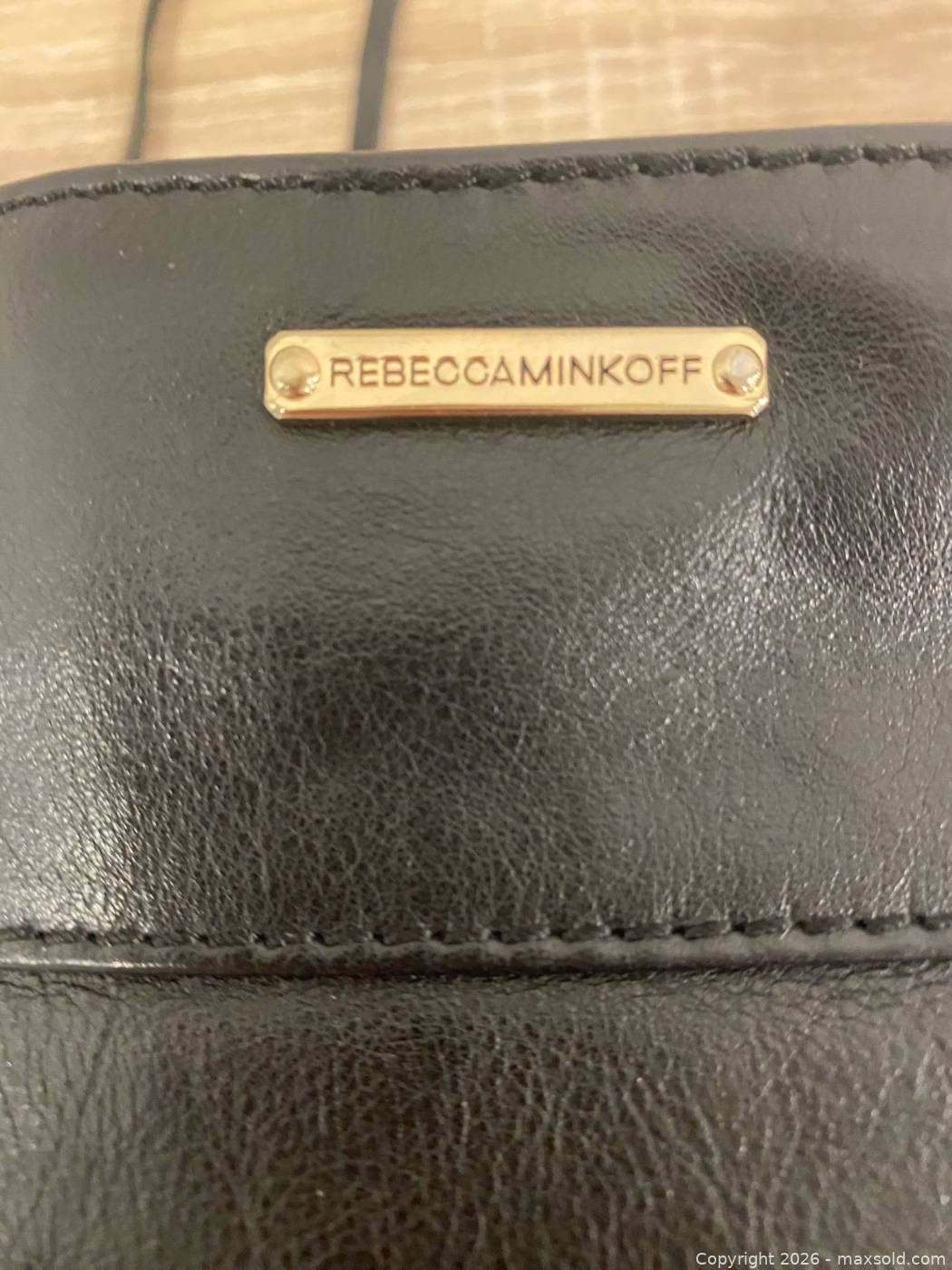 Rebecca Minkoff Swing black leather crossbody bag | Maxsold