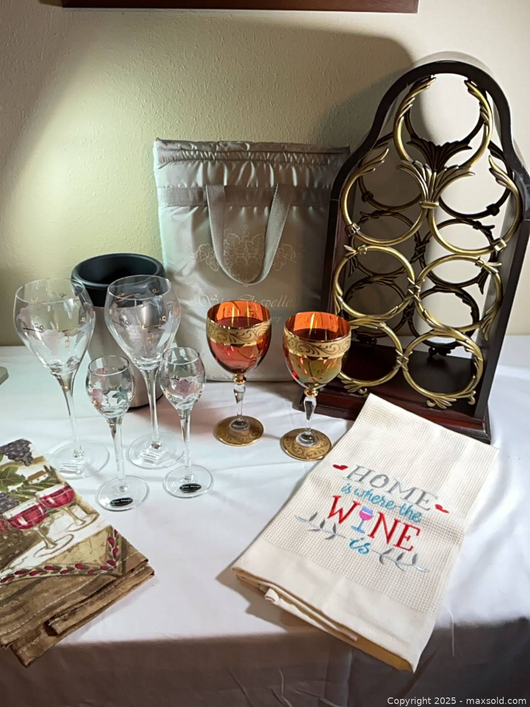 Wine rack, OXO cooler, stemware sets, towels | Maxsold
