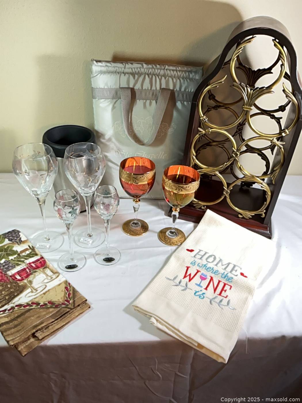 Wine rack, OXO cooler, stemware sets, towels | Maxsold