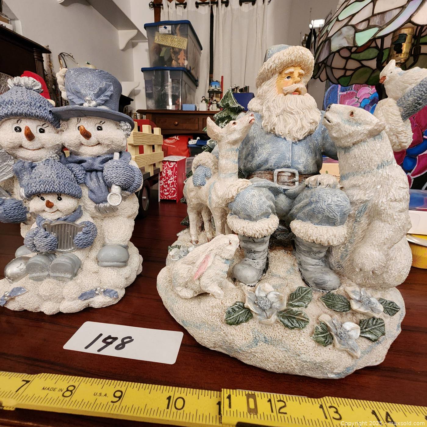 Two large Christmas figurine sculptures | Maxsold