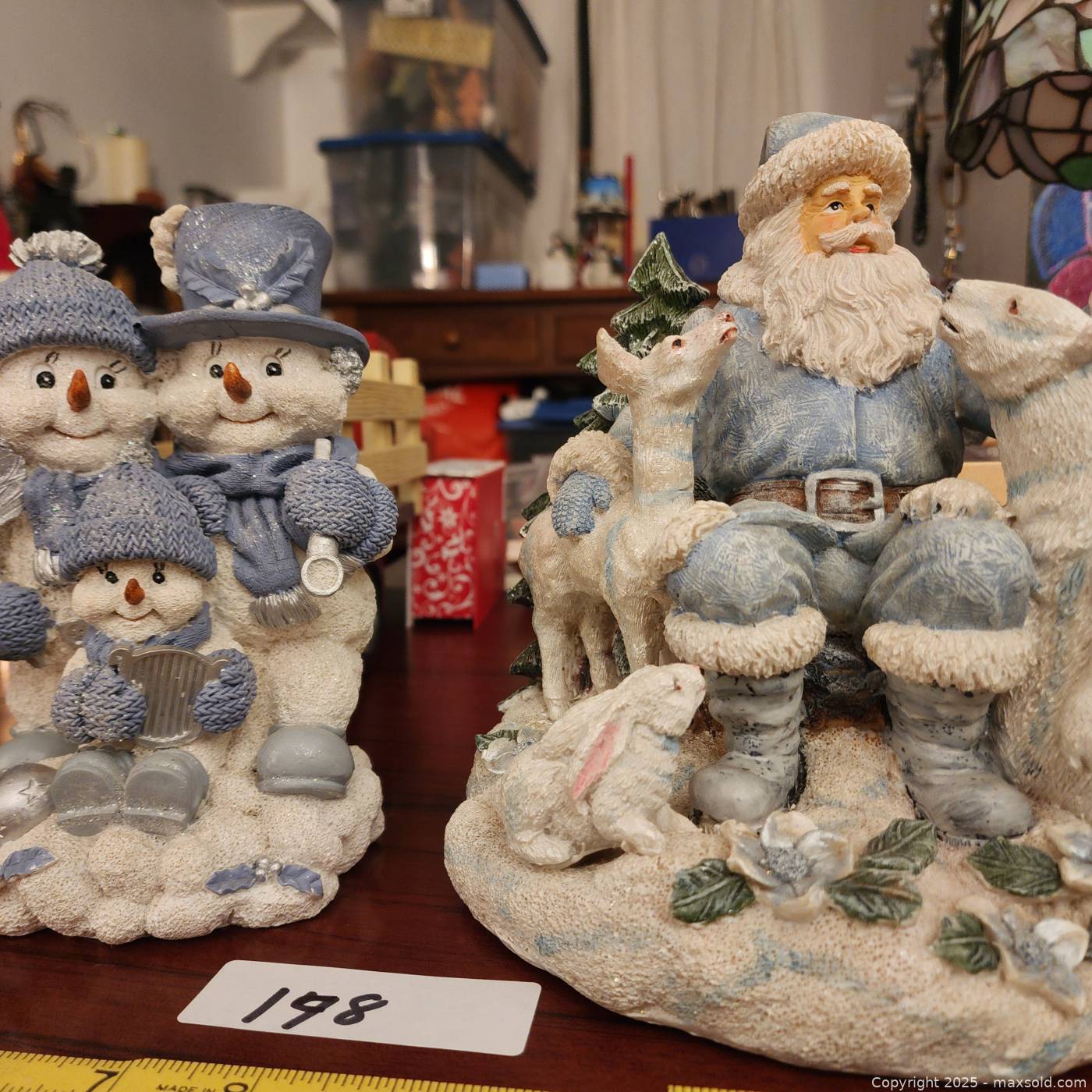 Two large Christmas figurine sculptures | Maxsold