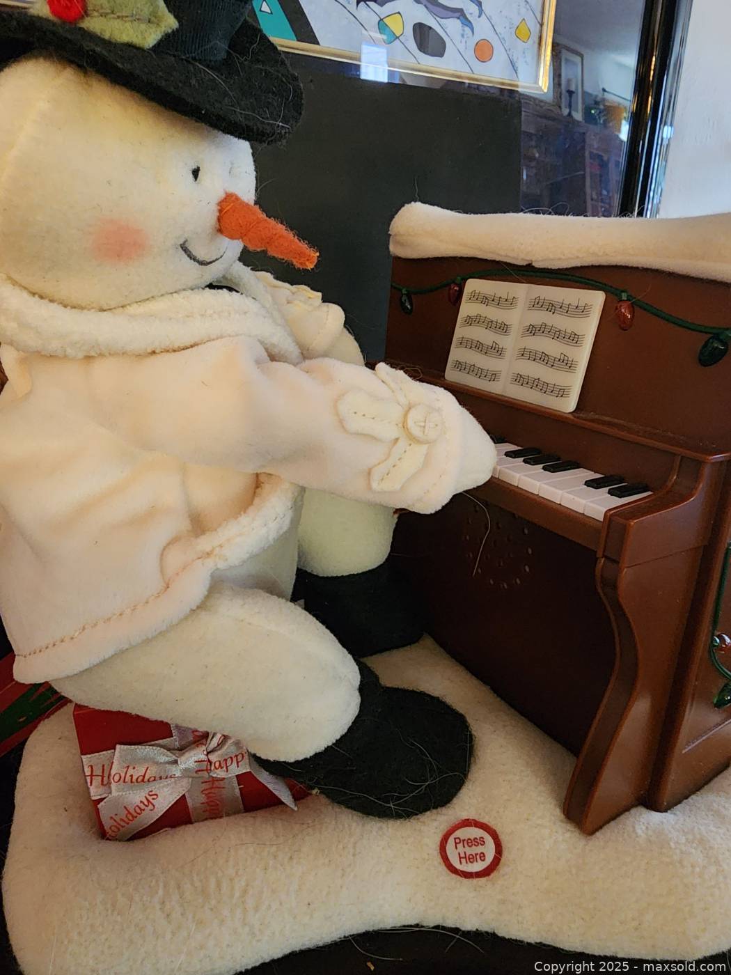 Animated snowman pianist and rocking horse | Maxsold