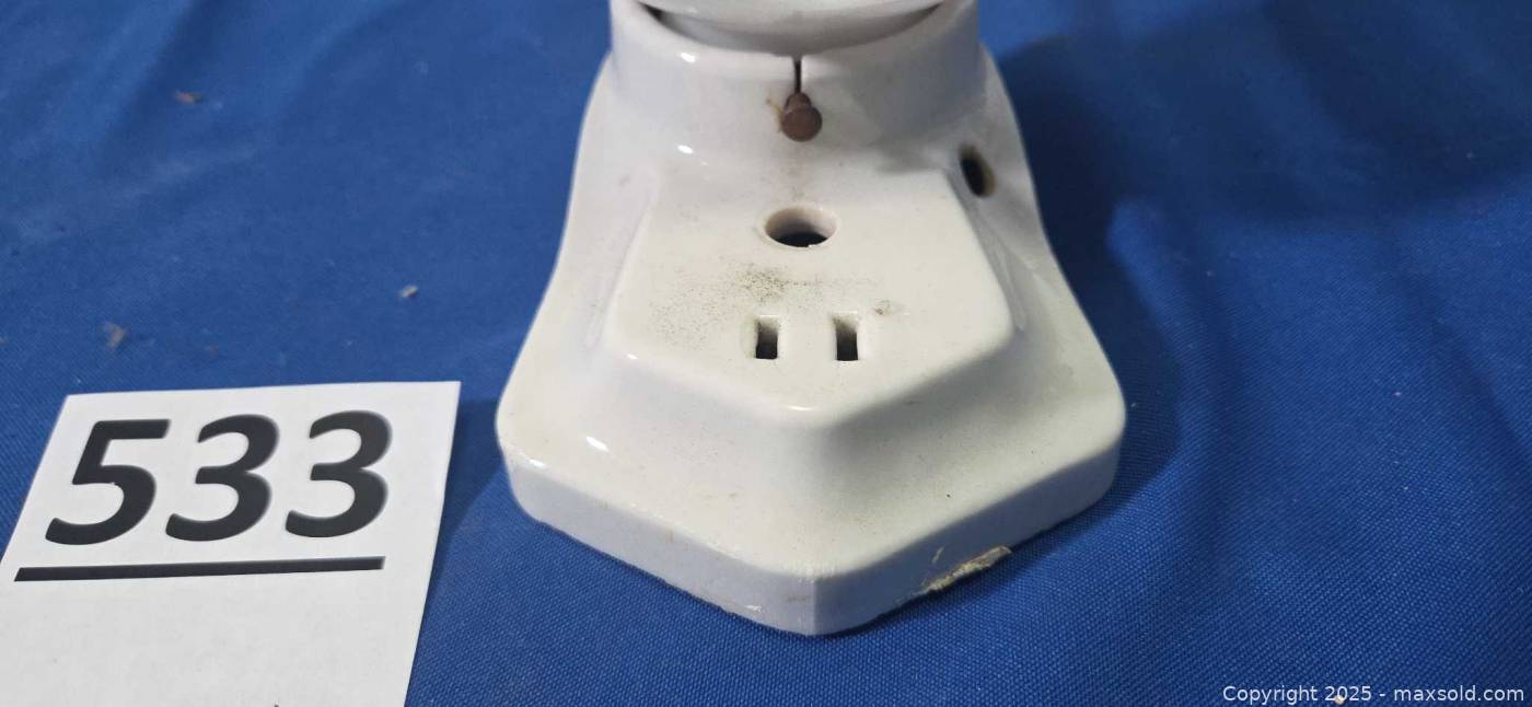 Art Deco porcelain wall sconce with milk glass globe | Maxsold