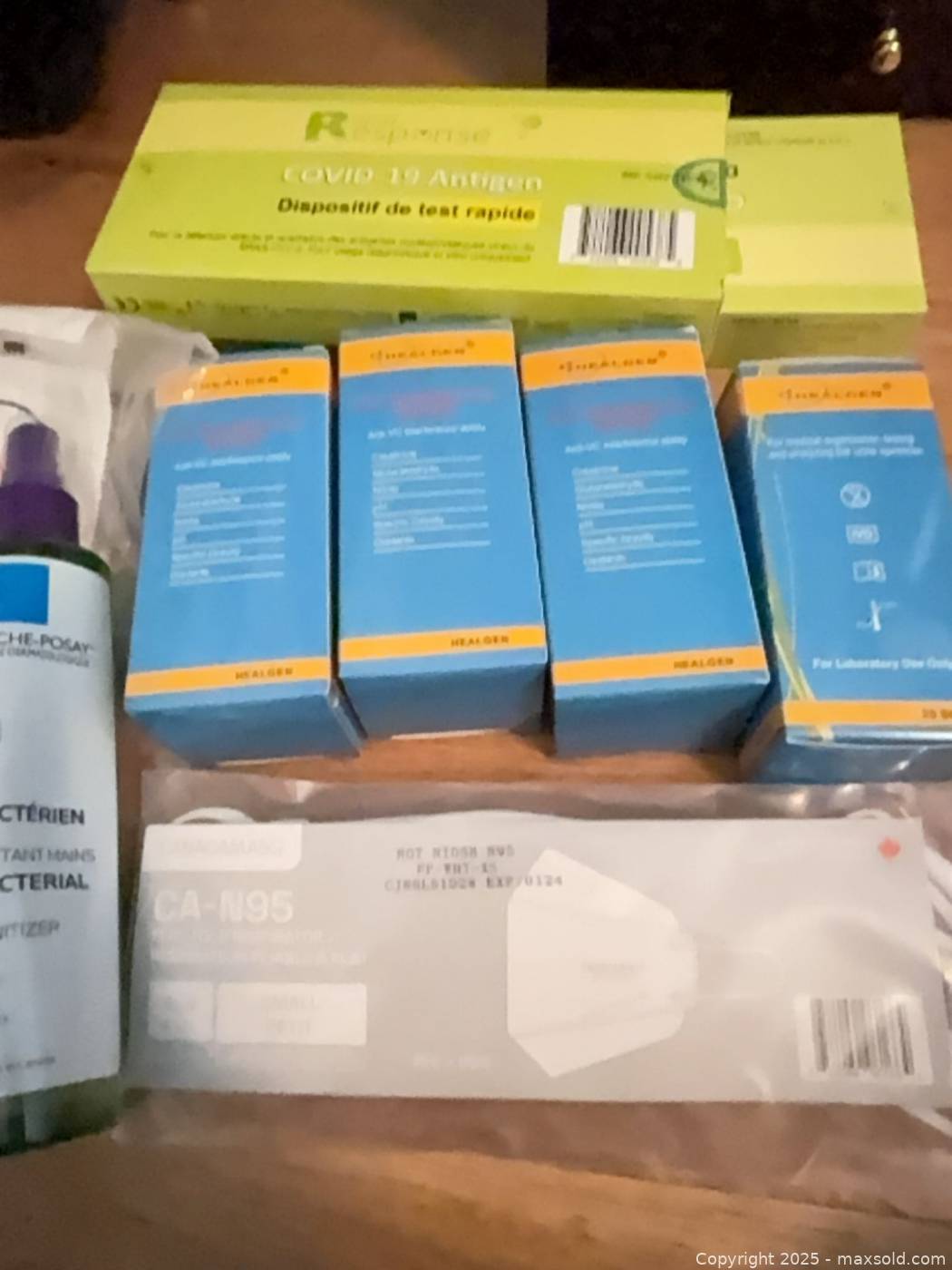 PPE, COVID-19 antigen kit, urine test strips, sanitizer, masks | Maxsold