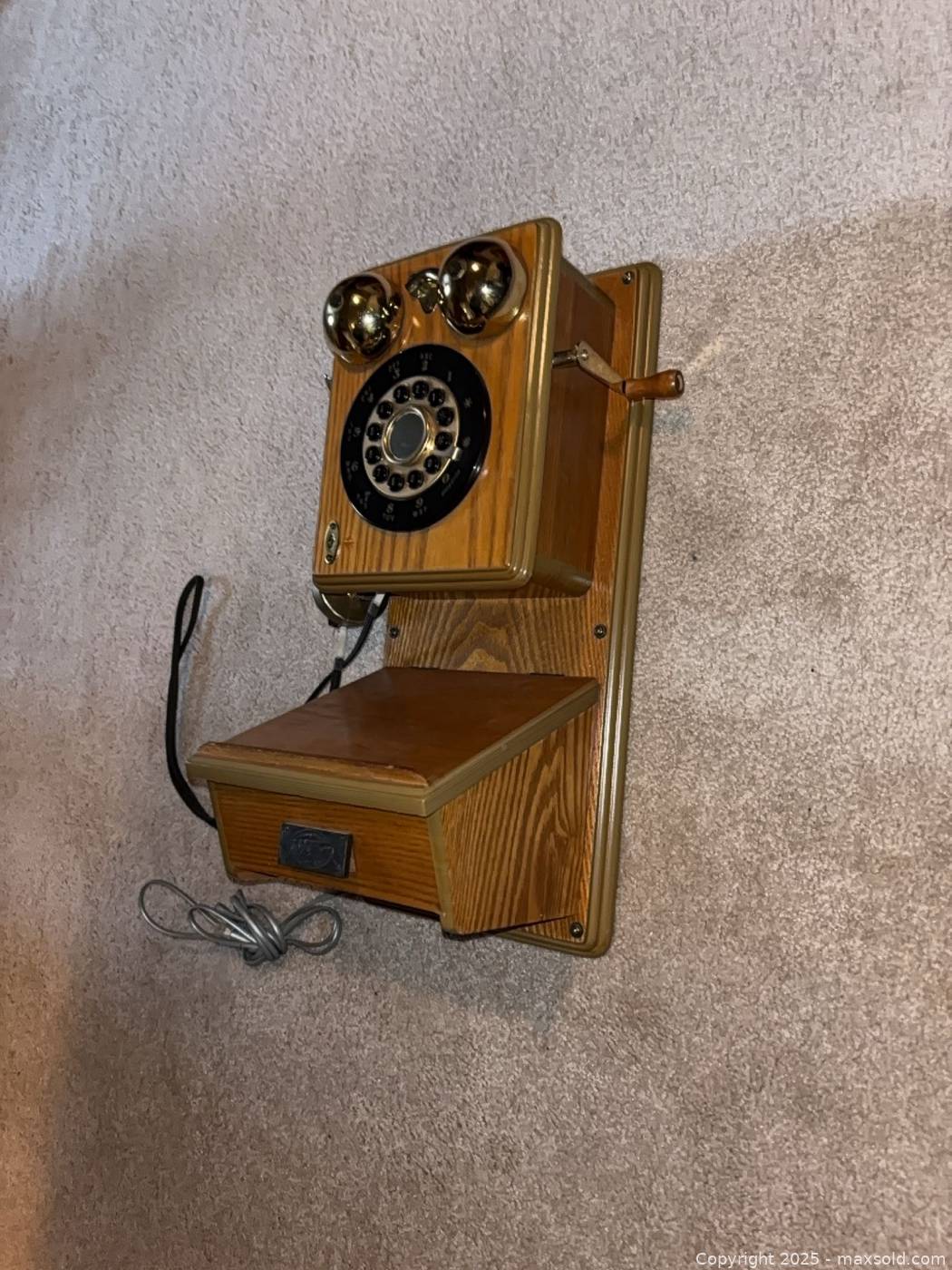 Spirit of St. Louis Wall-Mounted Rotary Telephone | Maxsold