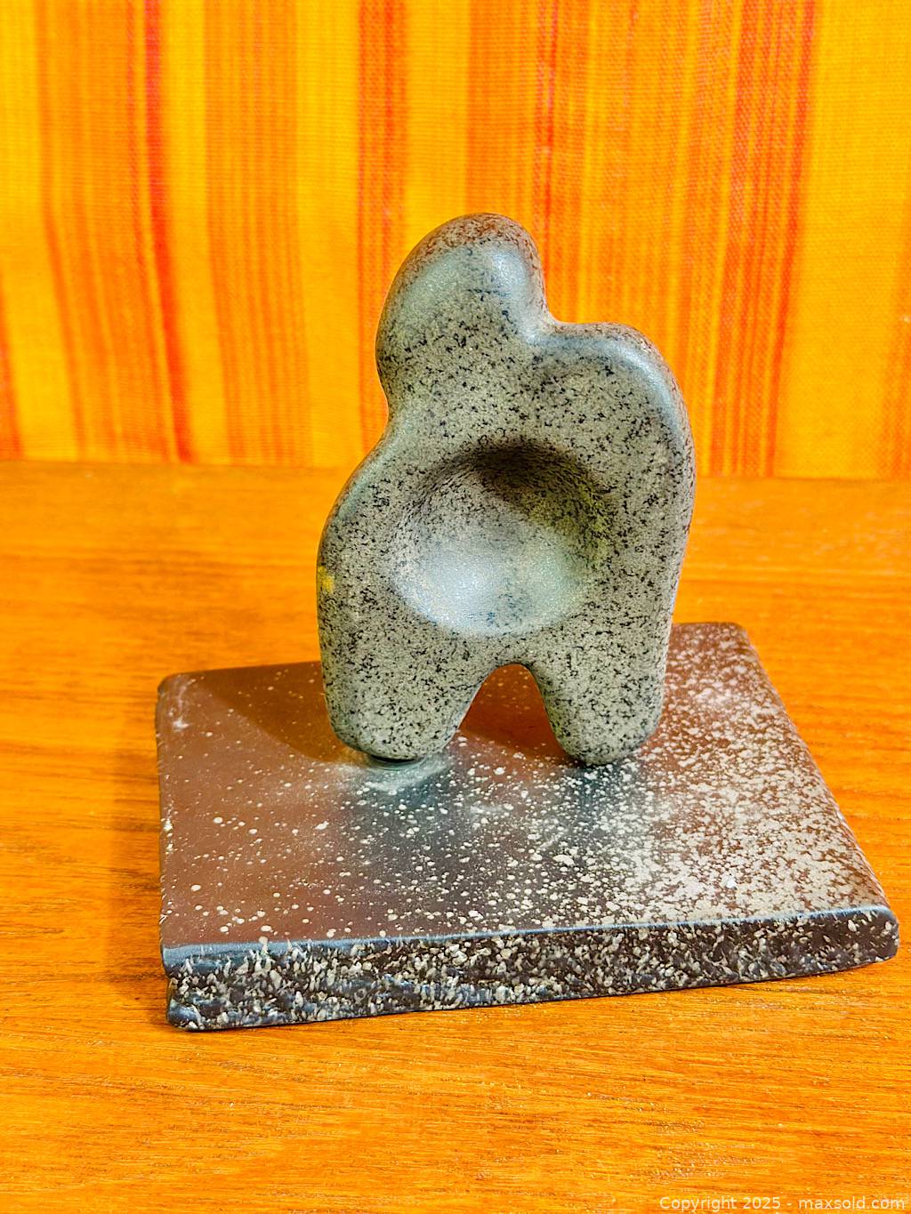 Abstract stone figure sculpture on base | Maxsold