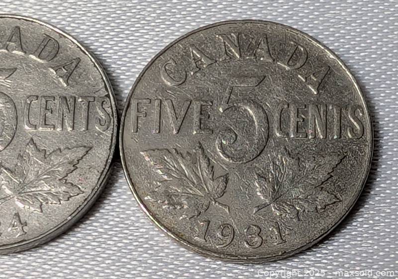 Two 1924 & 1931 Canada five-cent coins | Maxsold