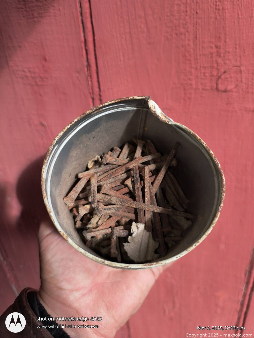 Daily Mail cigarette tin with 6-inch square nails | Maxsold