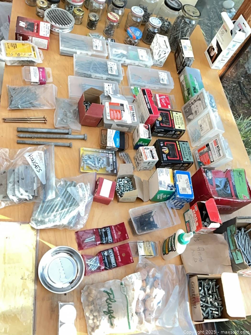 Assorted hardware fasteners and hinges | Maxsold