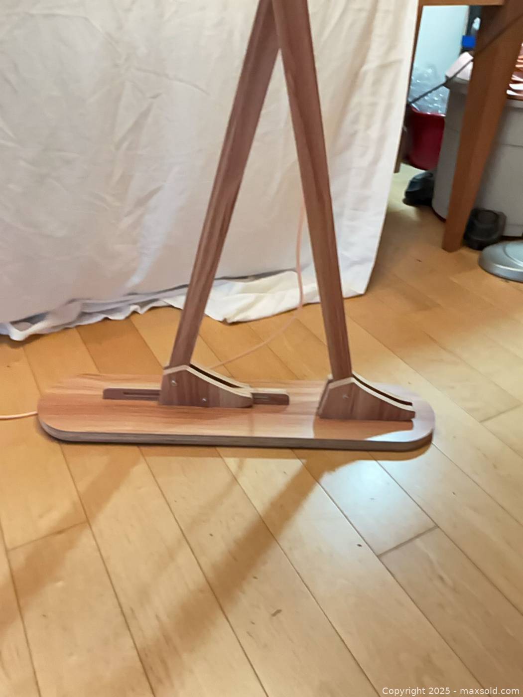Articulated wood human-form floor lamp | Maxsold