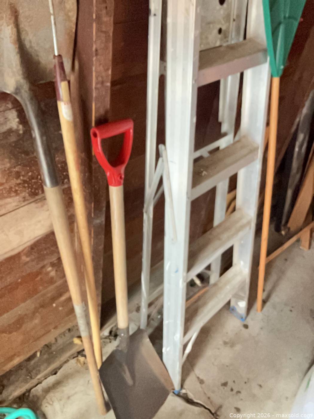 Garden tools and 5 ft step ladder | Maxsold