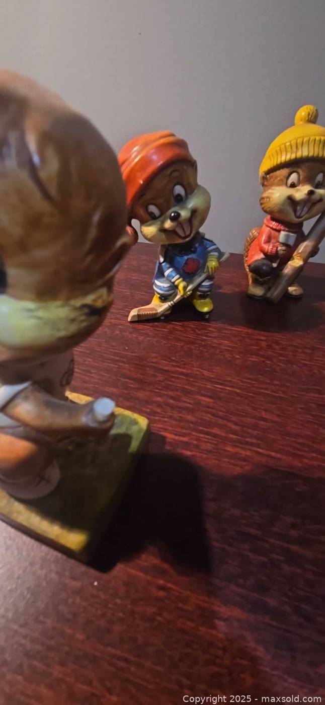 Seven 6-inch ceramic chipmunk figurines | Maxsold