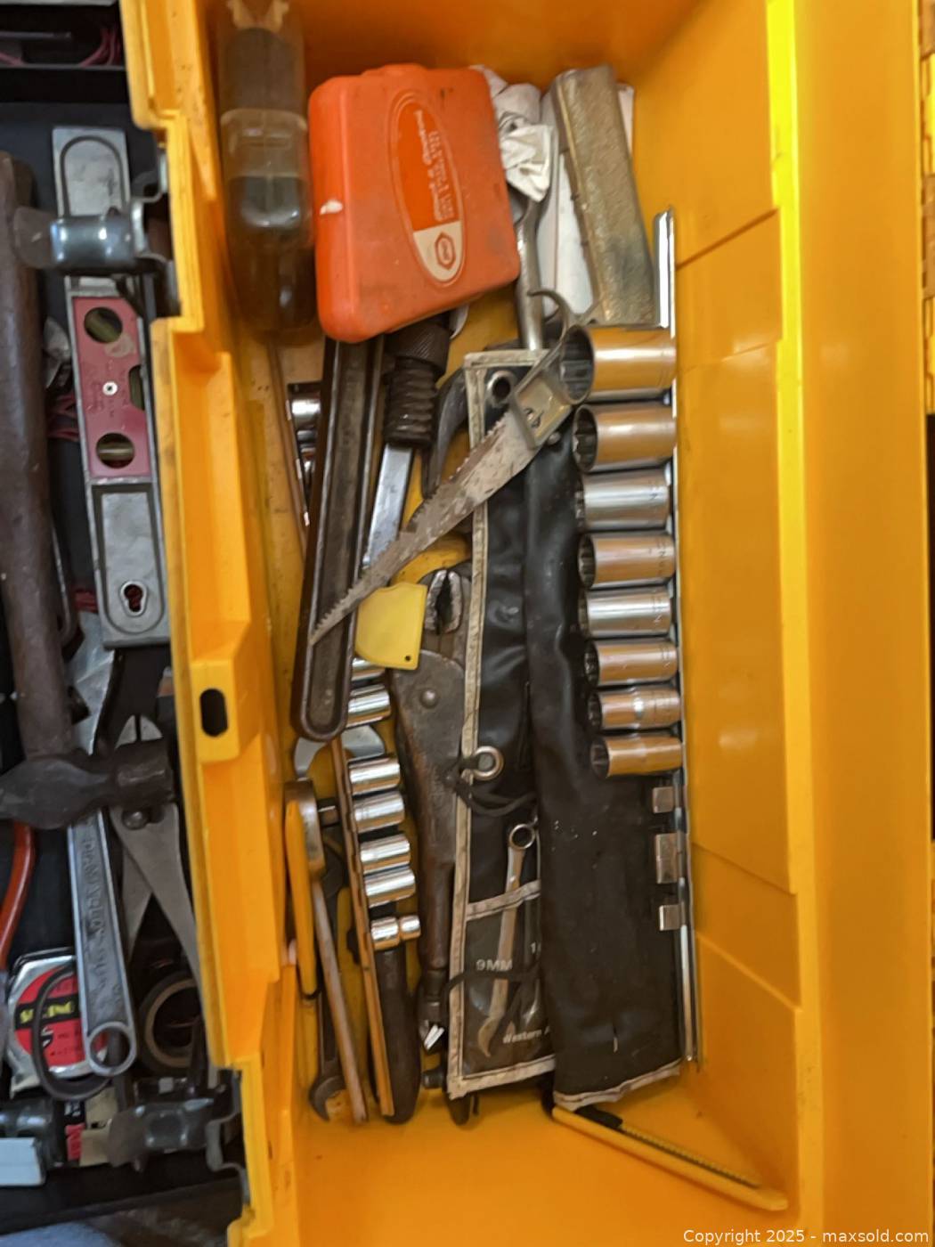 Yellow plastic toolbox with assorted hand tools | Maxsold