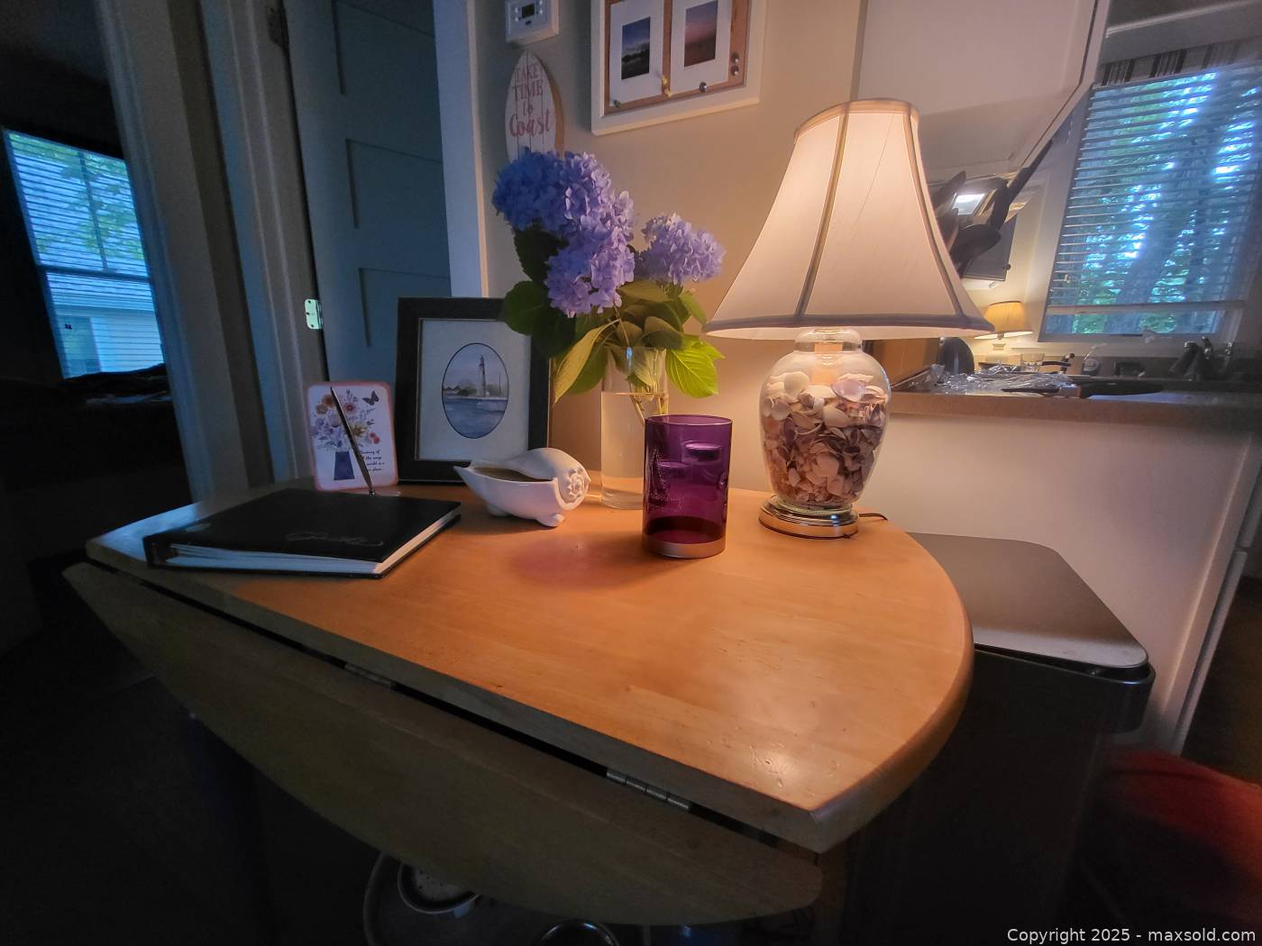 Solid wood drop-leaf dining table | Maxsold