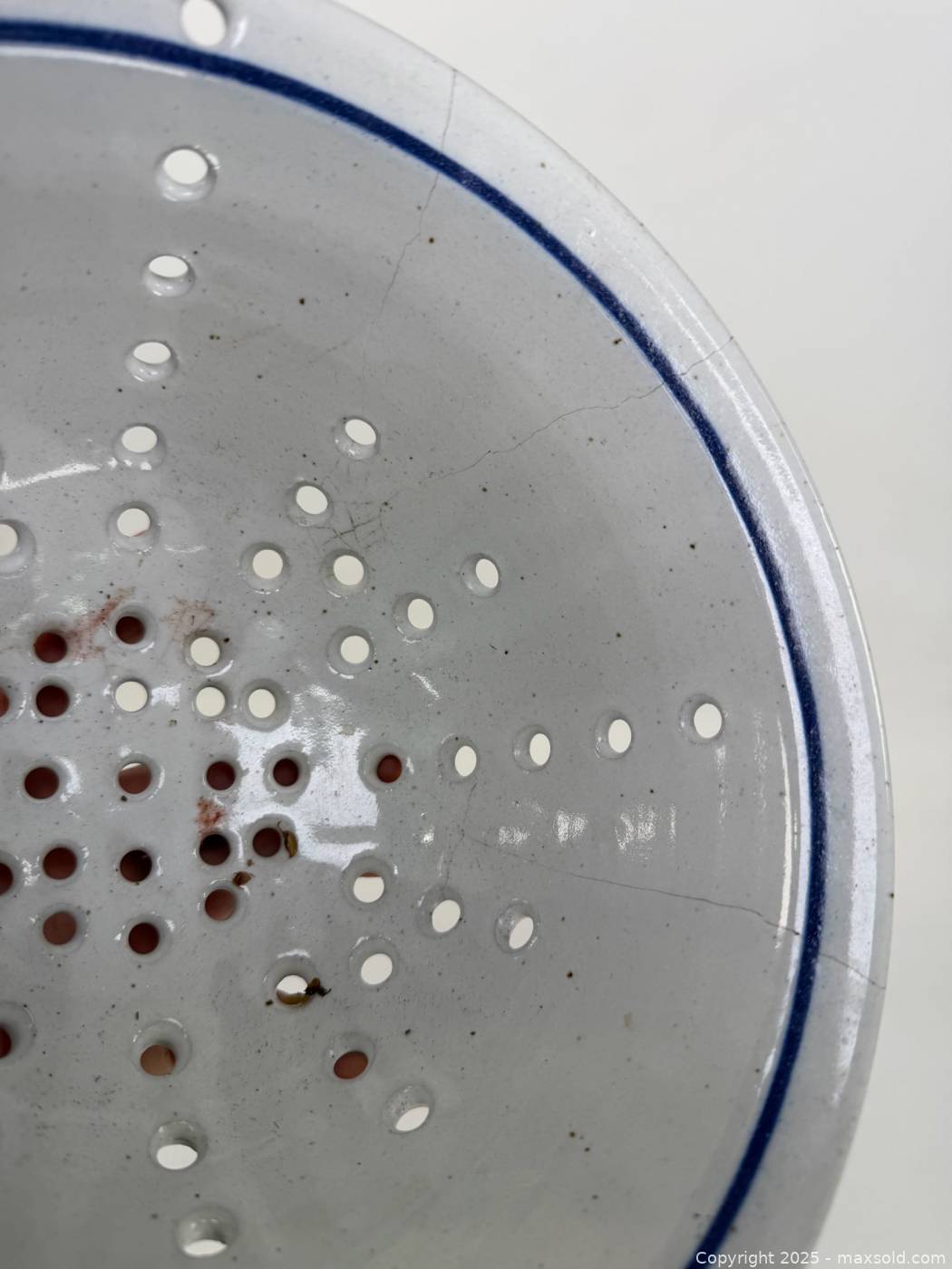 Handmade pottery colander | Maxsold