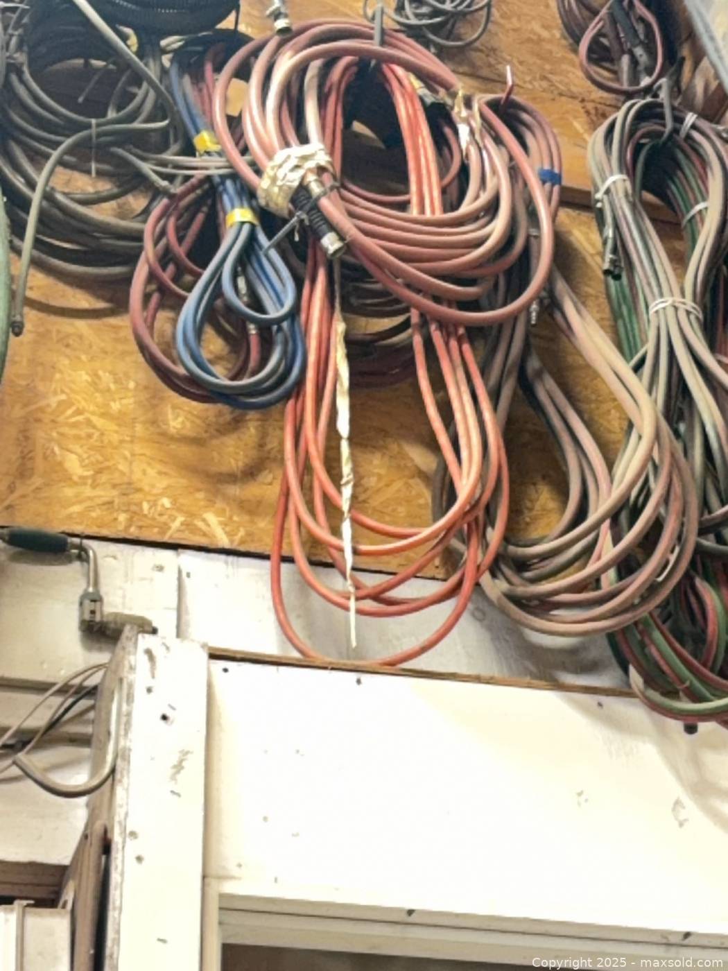 Coiled Welding and Air Hoses with Car Ramps | Maxsold