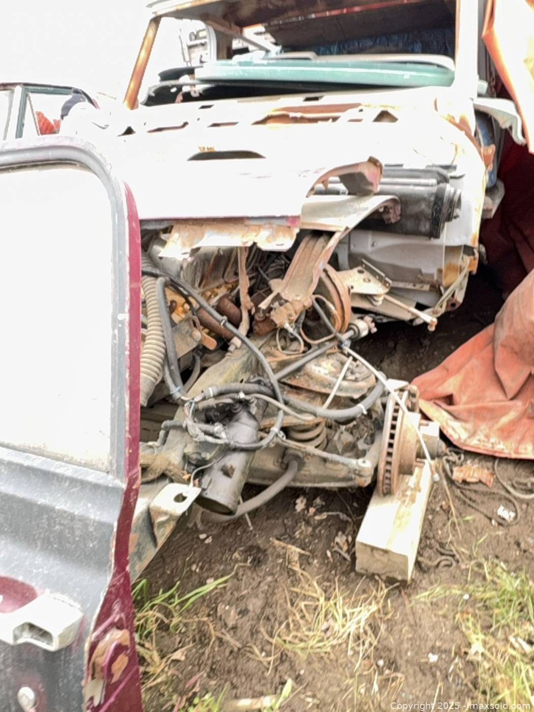 Stripped pickup truck body, door, propane tank, scrap metal | Maxsold