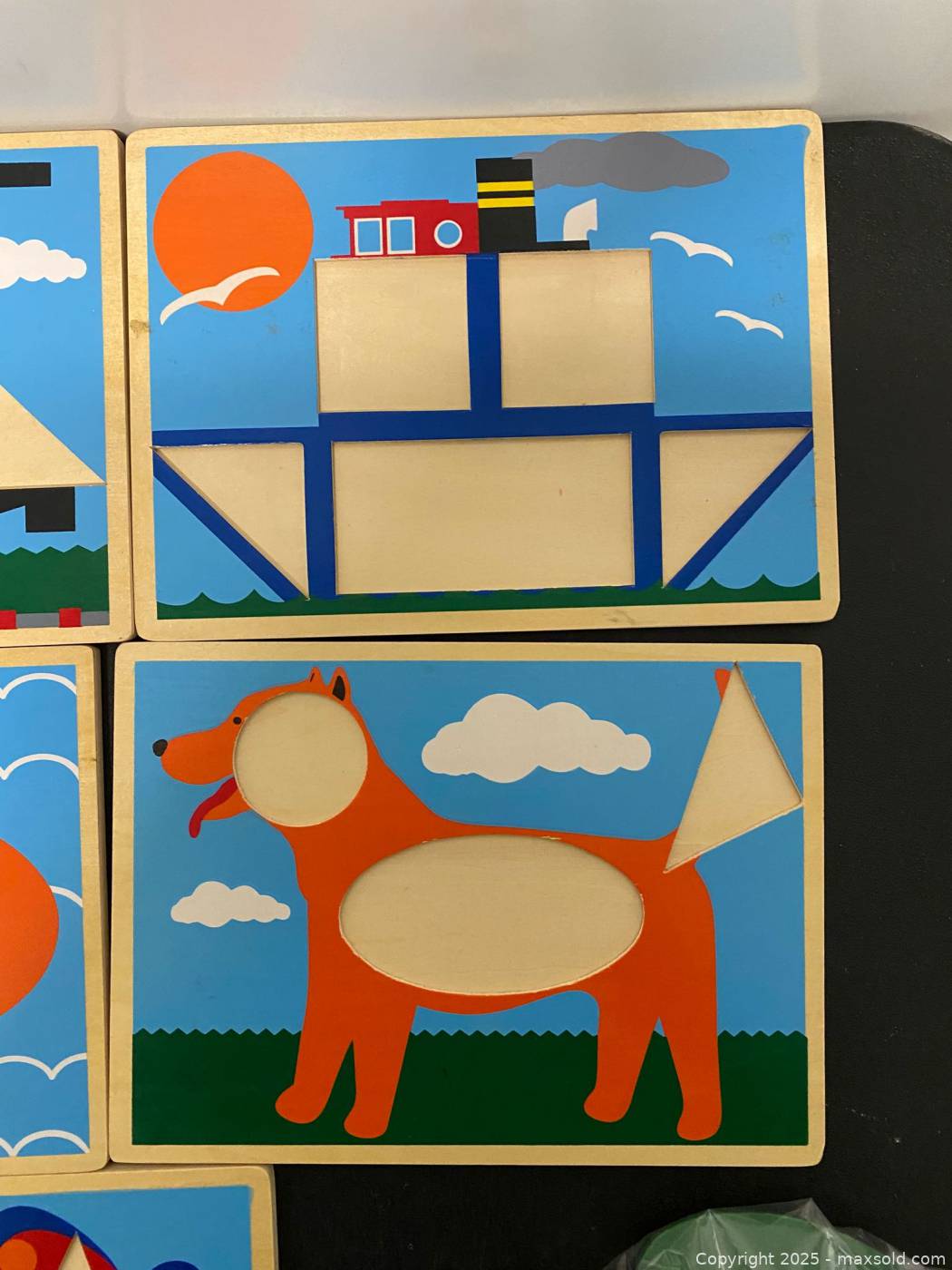 Wooden shape-matching puzzle boards set | Maxsold