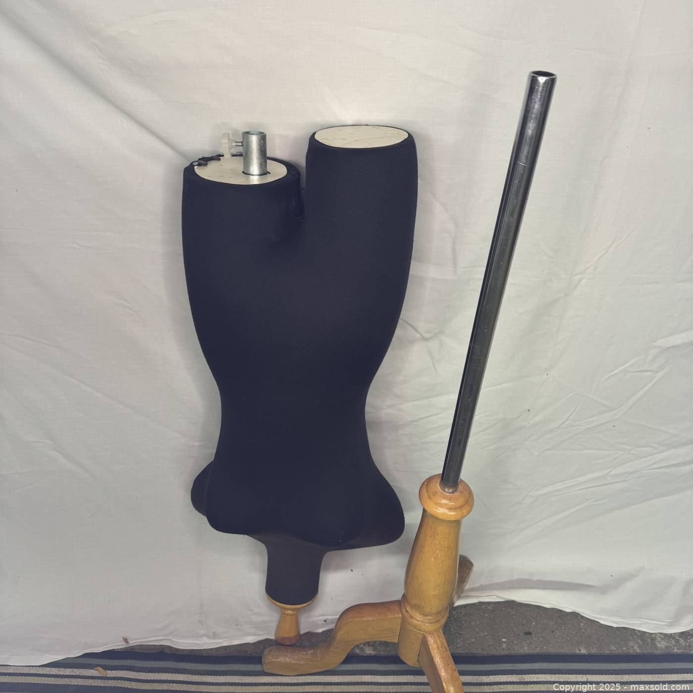 Navy dress form with wood tripod base | Maxsold
