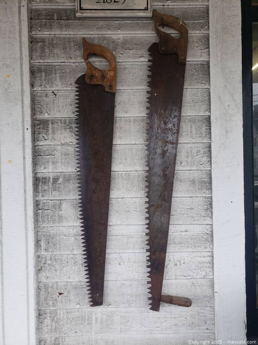 Pair of 19th-century hand saws | Maxsold