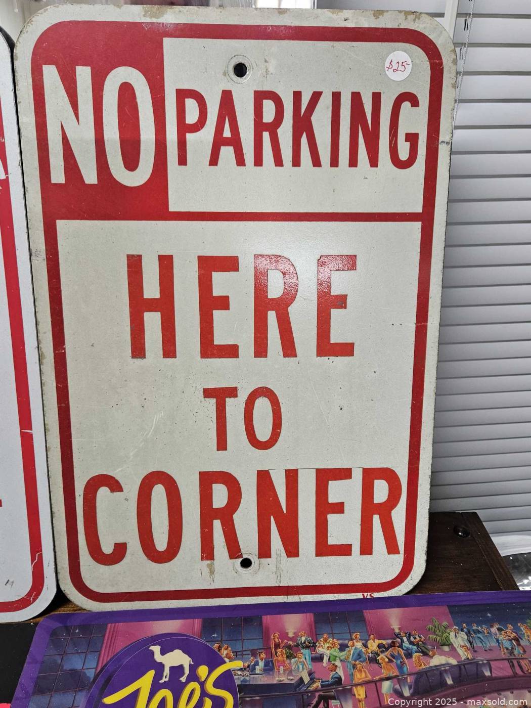 Vintage and modern parking and advertising metal signs | Maxsold