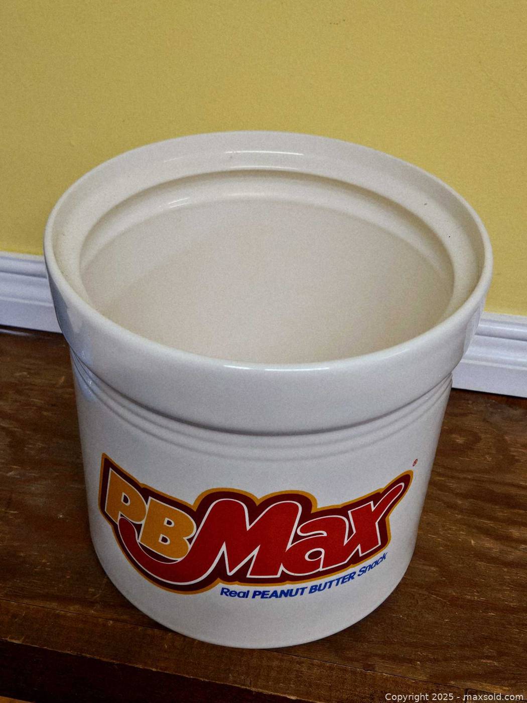 Nabisco girl and PB Max cookie jars | Maxsold