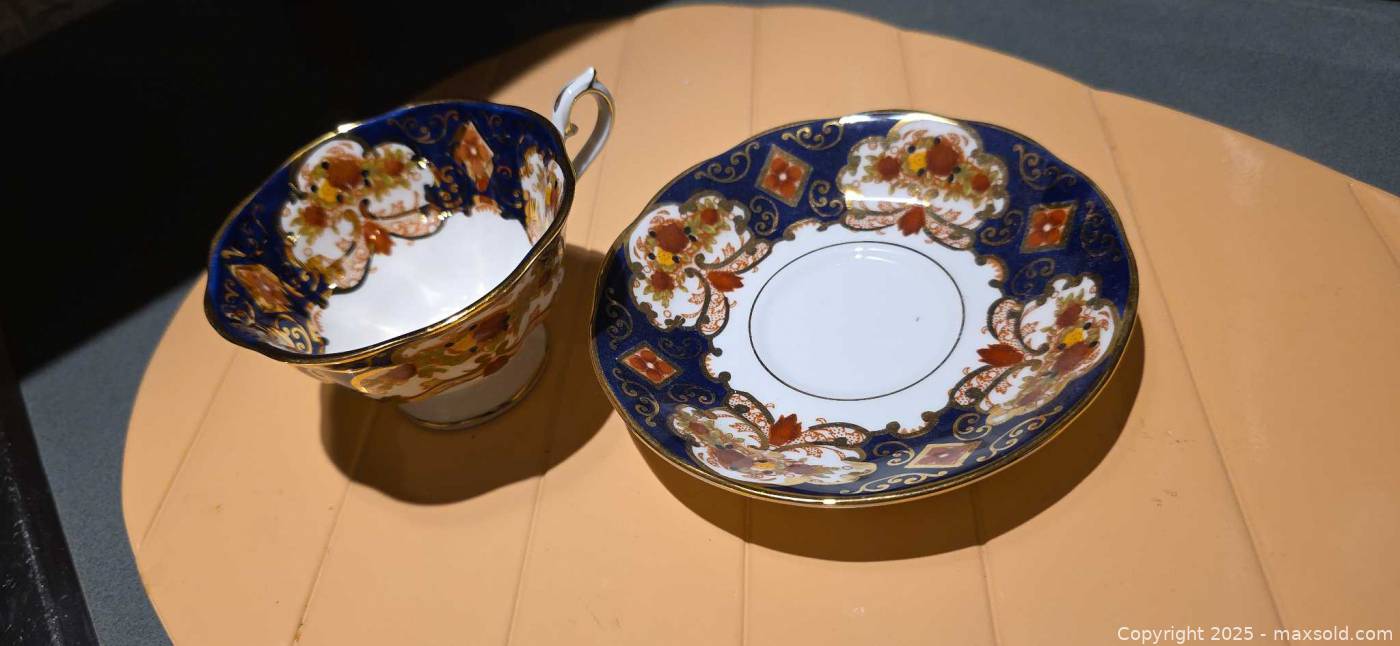 Royal Albert Heirloom bone china teacup and saucer | Maxsold
