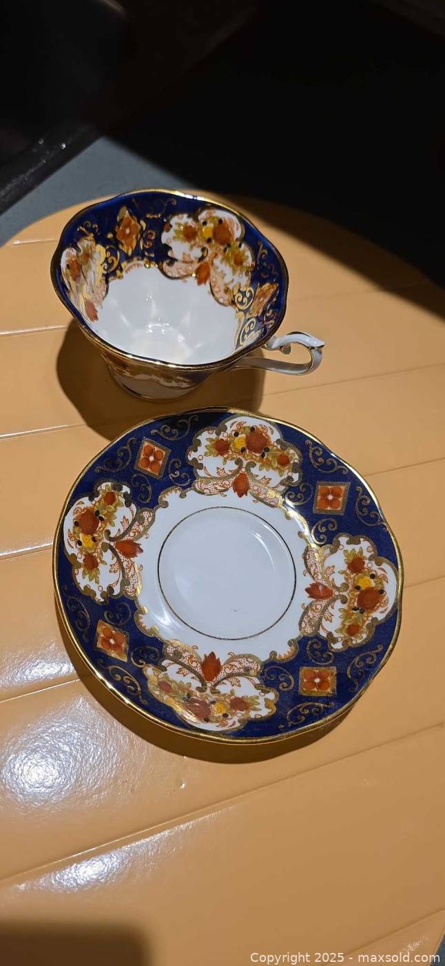 Royal Albert Heirloom bone china teacup and saucer | Maxsold