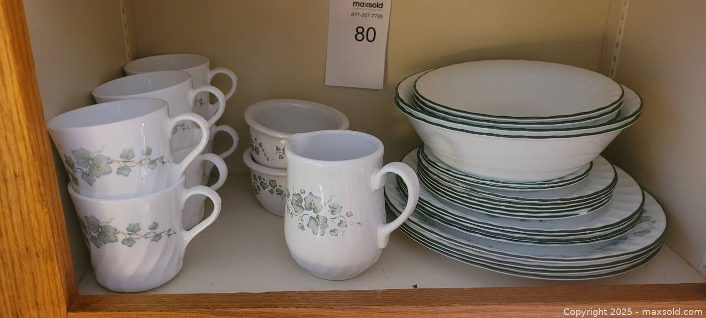 Corelle 4-place dinnerware with extra bowls | Maxsold