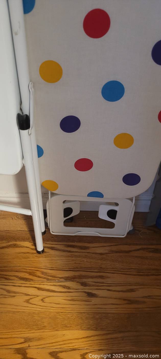 Small ironing board and folding chair | Maxsold