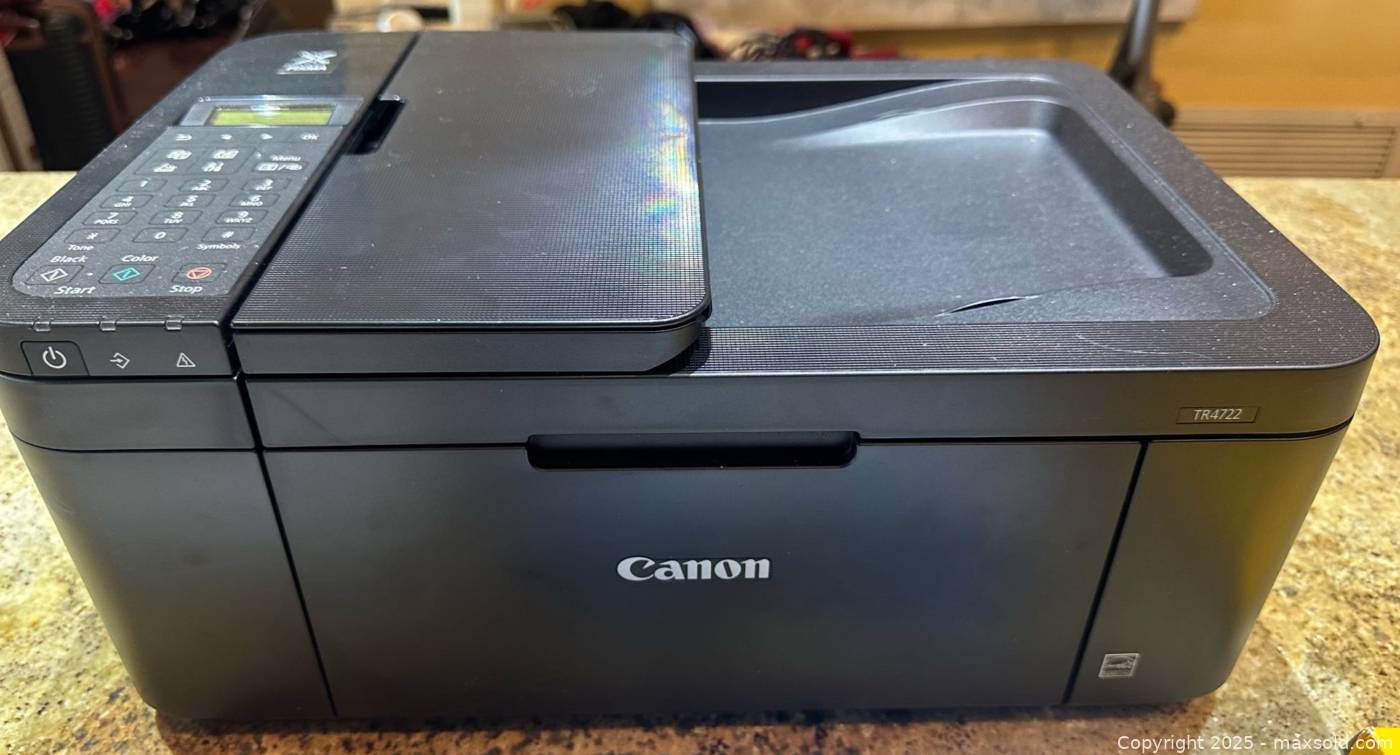 Canon Pixma TR4522 printer with paper | Maxsold