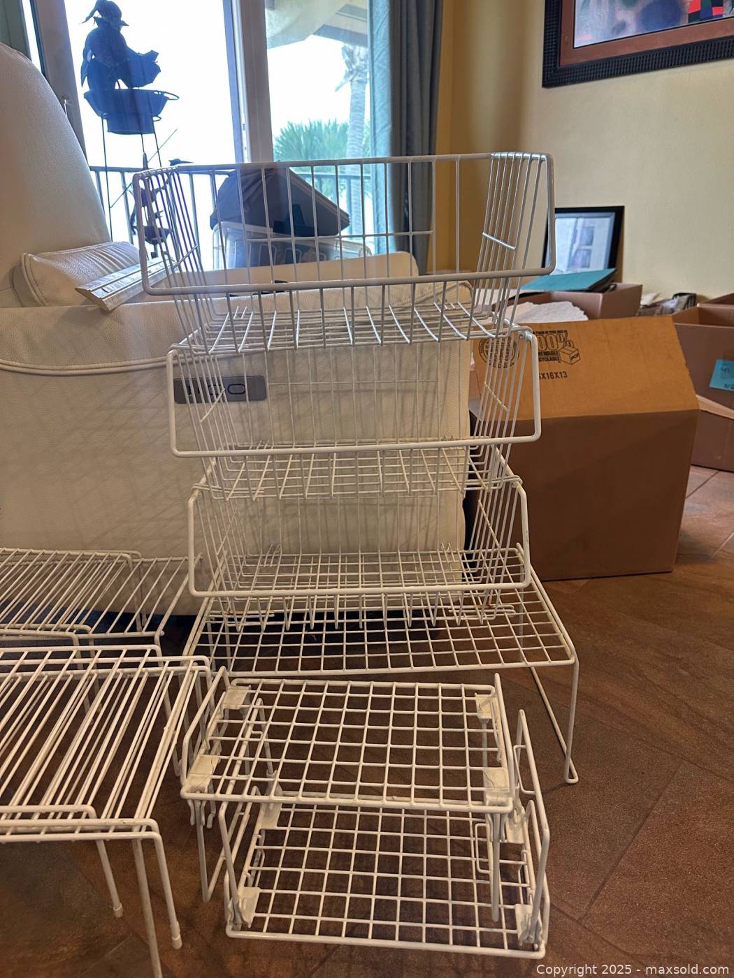 White coated wire shelf risers and stacking baskets | Maxsold