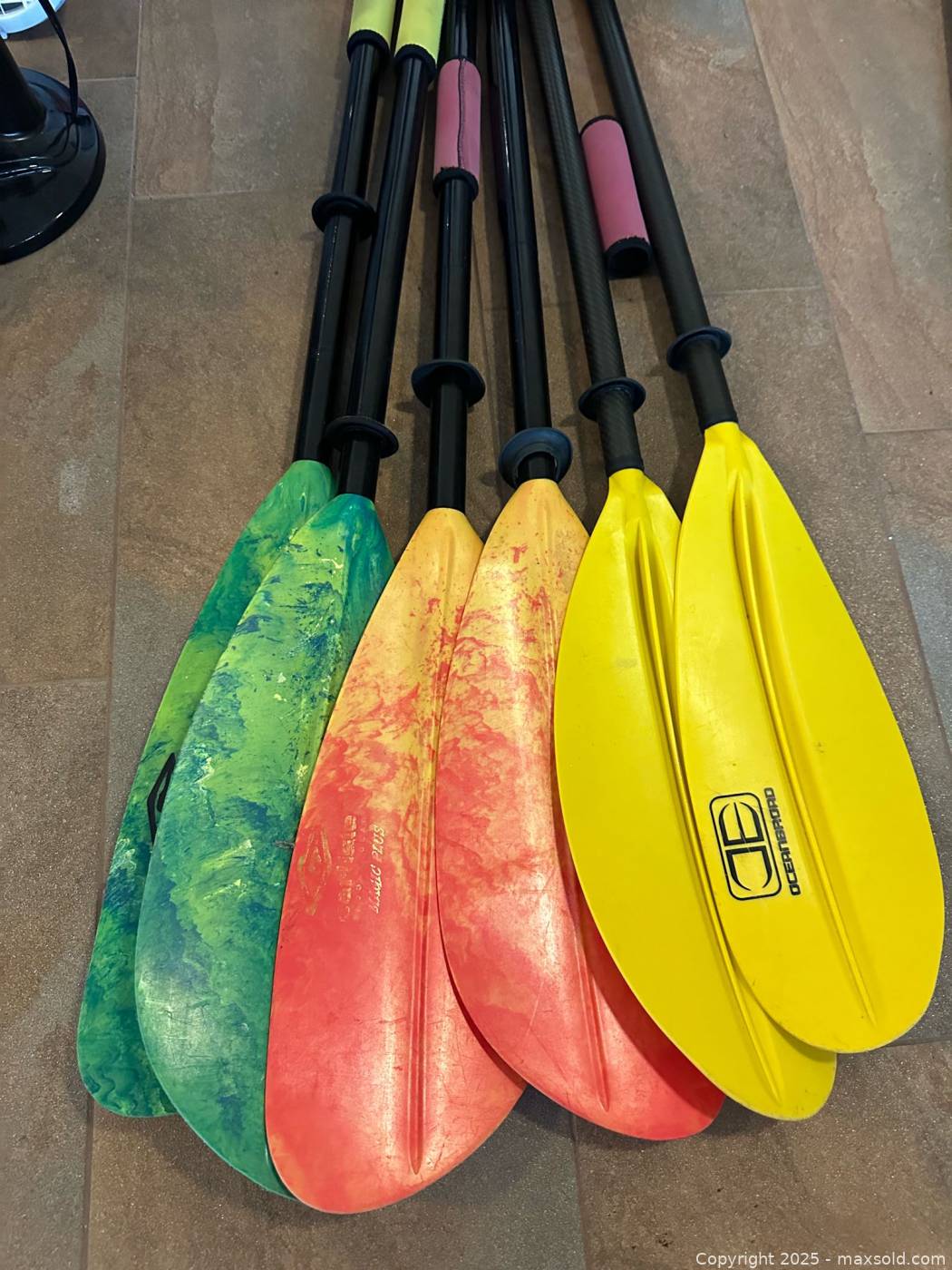 3 carbon-style two-piece kayak paddles with multi-color blades plus 2 ...