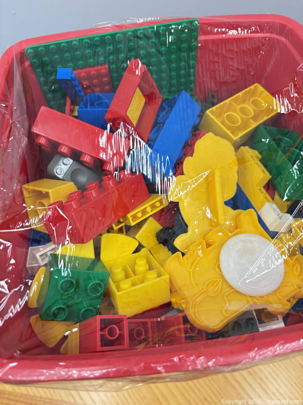 LEGO buckets and wooden block sets | Maxsold
