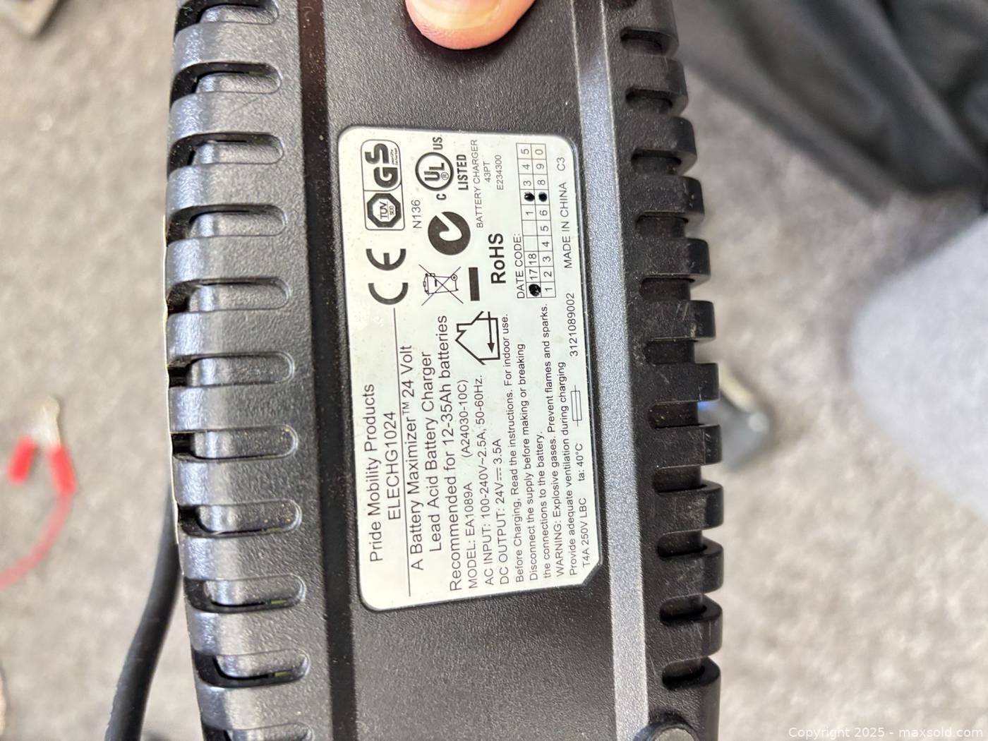 MotoMaster 12V and 24V battery chargers with manual double-barrel foot ...