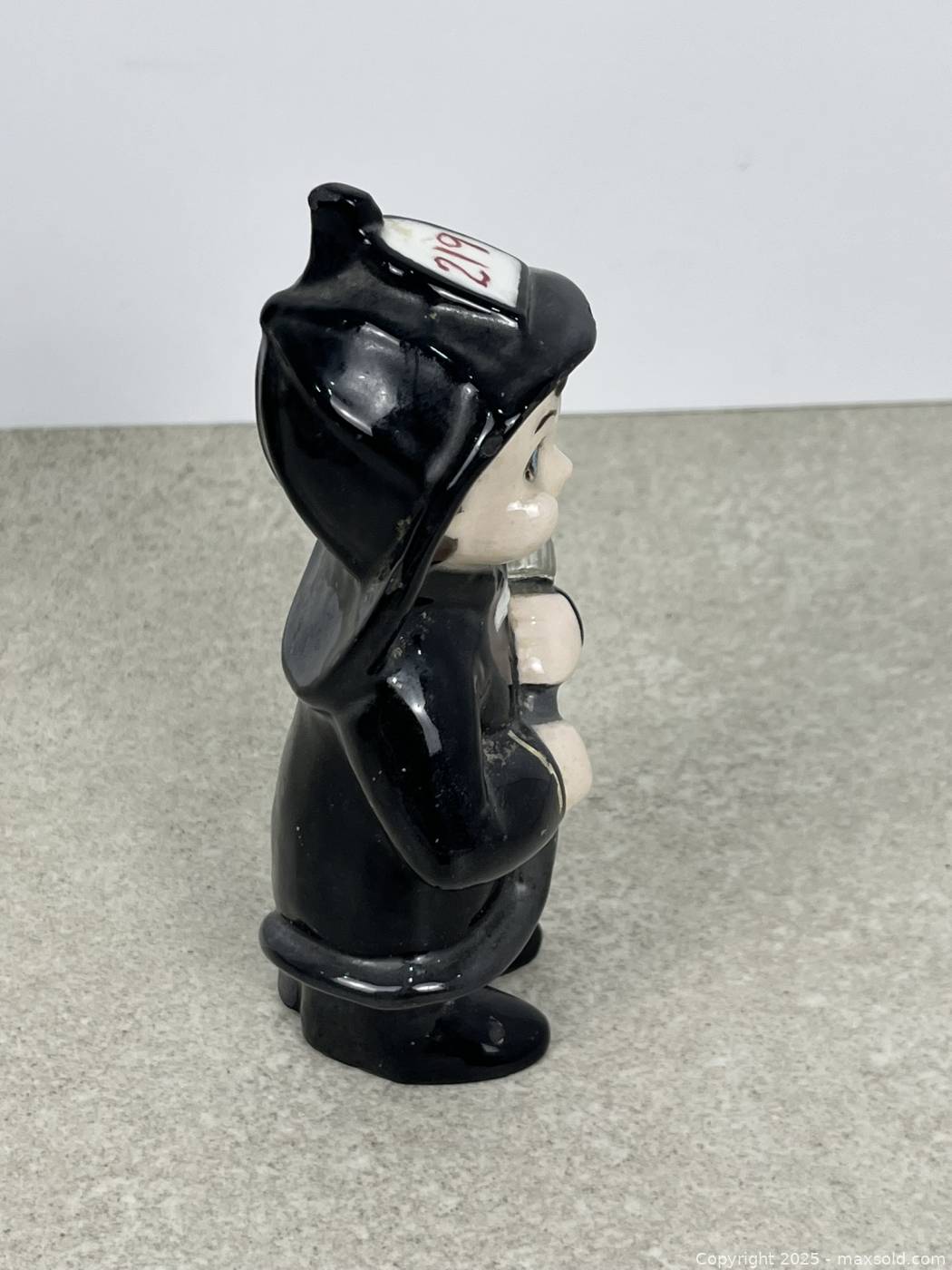 Vintage signed ceramic firefighter boy figurine | Maxsold