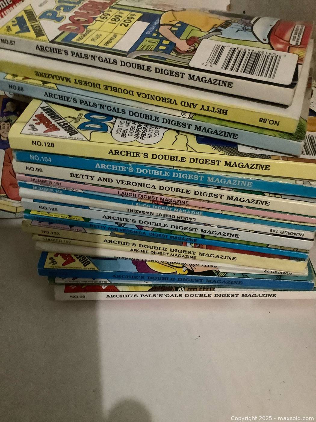 Archie comics, photo albums, sleeves | Maxsold