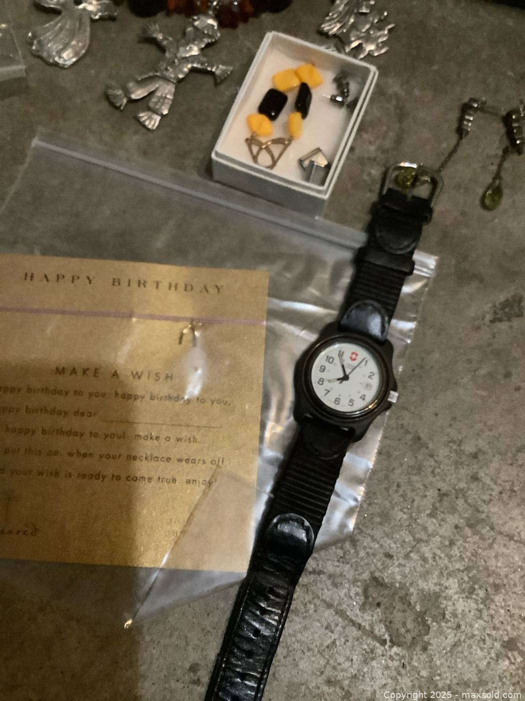 Assorted costume jewelry and Swiss watch | Maxsold