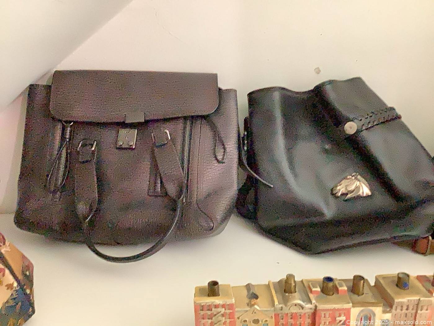 Prada, Isabella Fiore & other purses with menorah | Maxsold